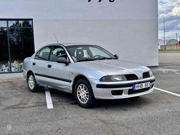 Grey Mitsubishi Carisma 2002 in Mazeikiai, with an engine capacity of 1.83 L and mileage of 180 thousand km for 550 €, photo 1 on AUTOMOTO.COM.LV