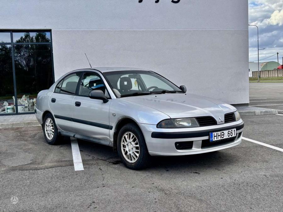 Grey Mitsubishi Carisma 2002 in Mazeikiai, with an engine capacity of 1.83 L and mileage of 180 thousand km for 550 €, photo 1 on AUTOMOTO.COM.LV