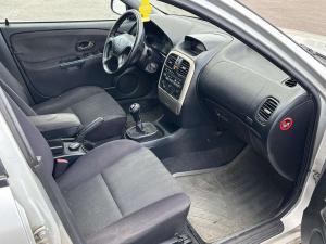 Grey Mitsubishi Carisma 2002 in Mazeikiai, with an engine capacity of 1.83 L and mileage of 180 thousand km for 550 €, photo 8 on AUTOMOTO.COM.LV