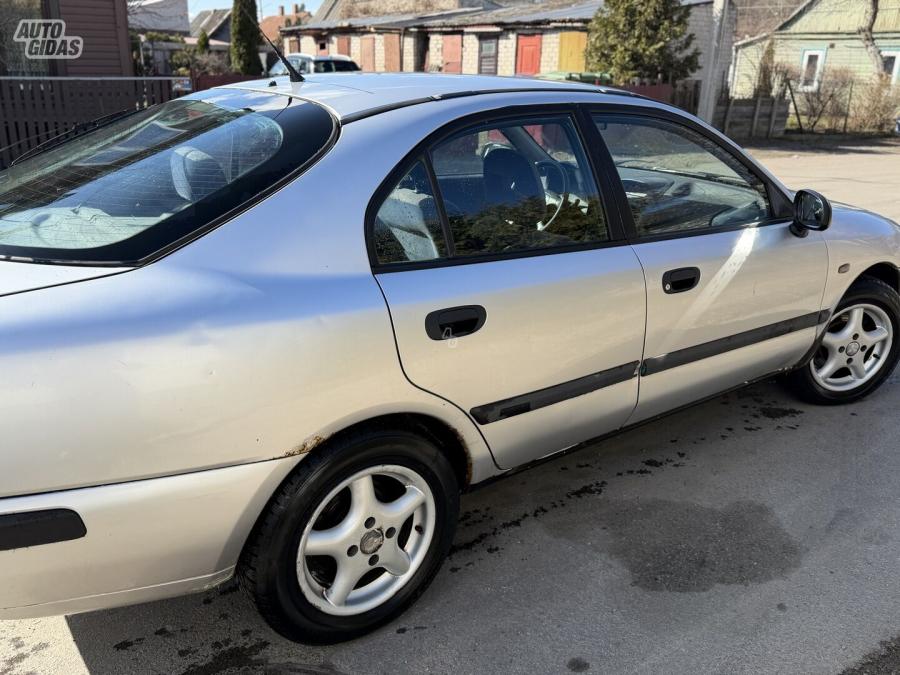 Pelēks Mitsubishi Carisma 2000 Kauņa, ar dzinēja tilpumu 1.90 L un nobraukumu 311 tūkst. km par 700 €, foto 5 vietnē AUTOMOTO.COM.LV