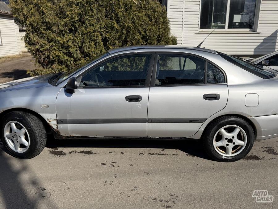 Pelēks Mitsubishi Carisma 2000 Kauņa, ar dzinēja tilpumu 1.90 L un nobraukumu 311 tūkst. km par 700 €, foto 8 vietnē AUTOMOTO.COM.LV