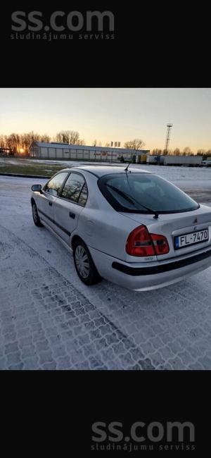Grey Mitsubishi Carisma 2002 in Riga, with an engine capacity of 1.80 L and mileage of 196 thousand km for 650 €, photo 3 on AUTOMOTO.COM.LV