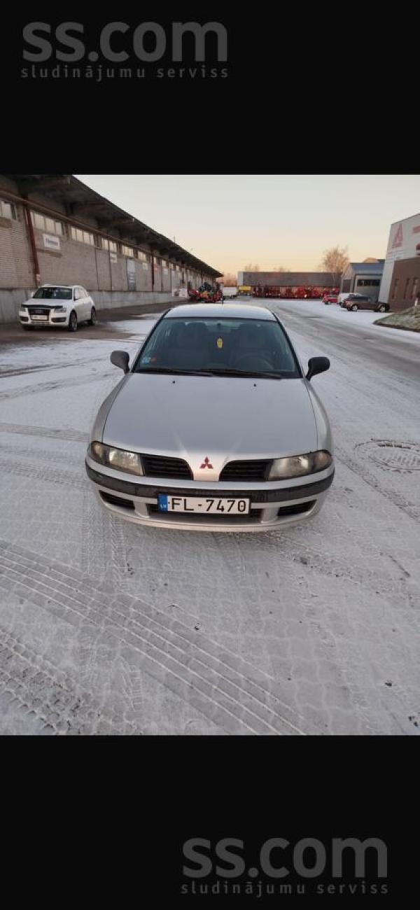 Pelēks Mitsubishi Carisma 2002 Rīga, ar dzinēja tilpumu 1.80 L un nobraukumu 196 tūkst. km par 650 €, foto 5 vietnē AUTOMOTO.COM.LV