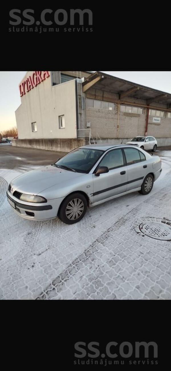 Pelēks Mitsubishi Carisma 2002 Rīga, ar dzinēja tilpumu 1.80 L un nobraukumu 196 tūkst. km par 650 €, foto 6 vietnē AUTOMOTO.COM.LV