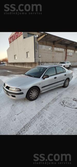 Grey Mitsubishi Carisma 2002 in Riga, with an engine capacity of 1.80 L and mileage of 196 thousand km for 650 €, photo 6 on AUTOMOTO.COM.LV