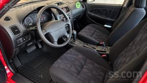 Sarkans Mitsubishi Carisma 1998 Rīga, ar dzinēja tilpumu 1.80 L un nobraukumu 42 tūkst. km par 10000 €, foto 4 vietnē AUTOMOTO.COM.LV