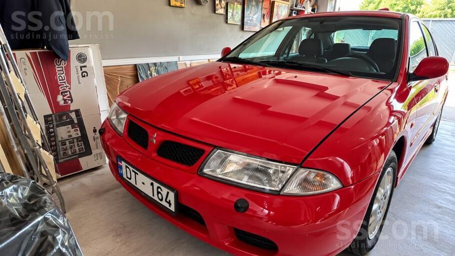 Sarkans Mitsubishi Carisma 1998 Rīga, ar dzinēja tilpumu 1.80 L un nobraukumu 42 tūkst. km par 10000 €, foto 7 vietnē AUTOMOTO.COM.LV