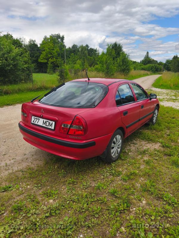 Red Mitsubishi Carisma 2003 in Parnu, with an engine capacity of 1.60 L and mileage of 74 thousand km for 1500 €, photo 3 on AUTOMOTO.COM.LV