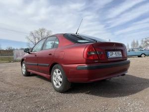 Red Mitsubishi Carisma 2000 in Daugavpils, with an engine capacity of 1.80 L and mileage of 245 thousand km for 1450 €, photo 4 on AUTOMOTO.COM.LV