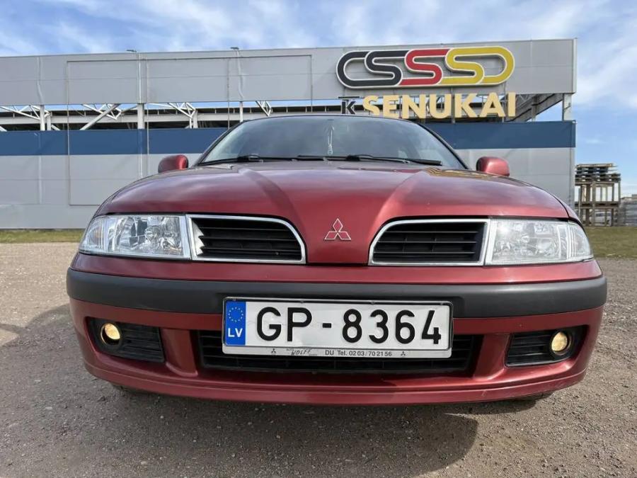 Red Mitsubishi Carisma 2000 in Daugavpils, with an engine capacity of 1.80 L and mileage of 245 thousand km for 1450 €, photo 9 on AUTOMOTO.COM.LV