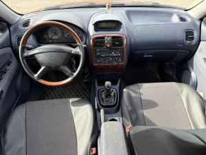 Red Mitsubishi Carisma 2000 in Daugavpils, with an engine capacity of 1.80 L and mileage of 245 thousand km for 1450 €, photo 10 on AUTOMOTO.COM.LV