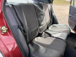 Red Mitsubishi Carisma 2000 in Daugavpils, with an engine capacity of 1.80 L and mileage of 245 thousand km for 1450 €, photo 21 on AUTOMOTO.COM.LV