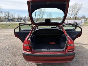 Red Mitsubishi Carisma 2000 in Daugavpils, with an engine capacity of 1.80 L and mileage of 245 thousand km for 1450 €, photo 24 on AUTOMOTO.COM.LV