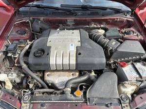 Red Mitsubishi Carisma 2000 in Daugavpils, with an engine capacity of 1.80 L and mileage of 245 thousand km for 1450 €, photo 27 on AUTOMOTO.COM.LV