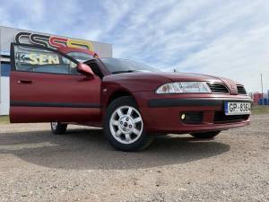 Red Mitsubishi Carisma 2000 in Daugavpils, with an engine capacity of 1.80 L and mileage of 245 thousand km for 1450 €, photo 31 on AUTOMOTO.COM.LV