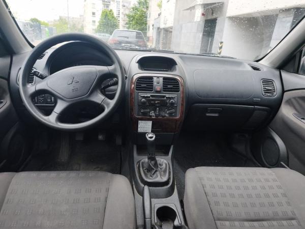 Mitsubishi Carisma 2001 in Vilnius, with an engine capacity of 1.90 L and mileage of 139 thousand km for 650 €, photo 10 on AUTOMOTO.COM.LV