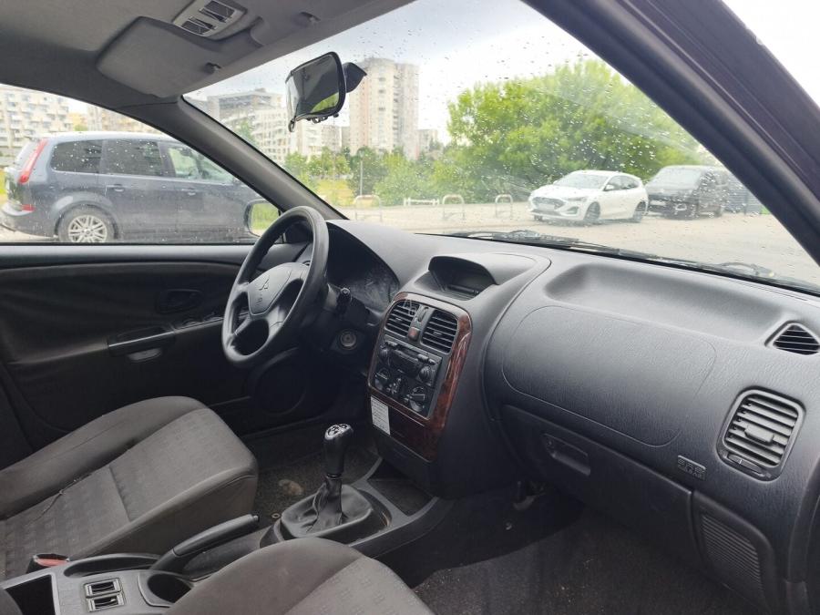 Mitsubishi Carisma 2001 Viļņa, ar dzinēja tilpumu 1.90 L un nobraukumu 139 tūkst. km par 650 €, foto 12 vietnē AUTOMOTO.COM.LV