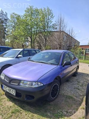 Violets Mitsubishi Carisma 1997 Valmiera, ar dzinēja tilpumu 1.90 L un nobraukumu 372 tūkst. km par 900 €, foto 3 vietnē AUTOMOTO.COM.LV
