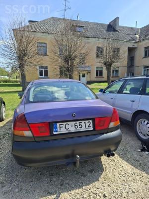Violets Mitsubishi Carisma 1997 Valmiera, ar dzinēja tilpumu 1.90 L un nobraukumu 372 tūkst. km par 900 €, foto 4 vietnē AUTOMOTO.COM.LV
