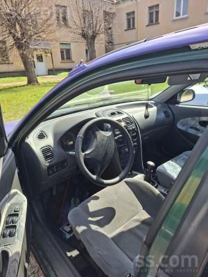 Violets Mitsubishi Carisma 1997 Valmiera, ar dzinēja tilpumu 1.90 L un nobraukumu 372 tūkst. km par 900 €, foto 5 vietnē AUTOMOTO.COM.LV