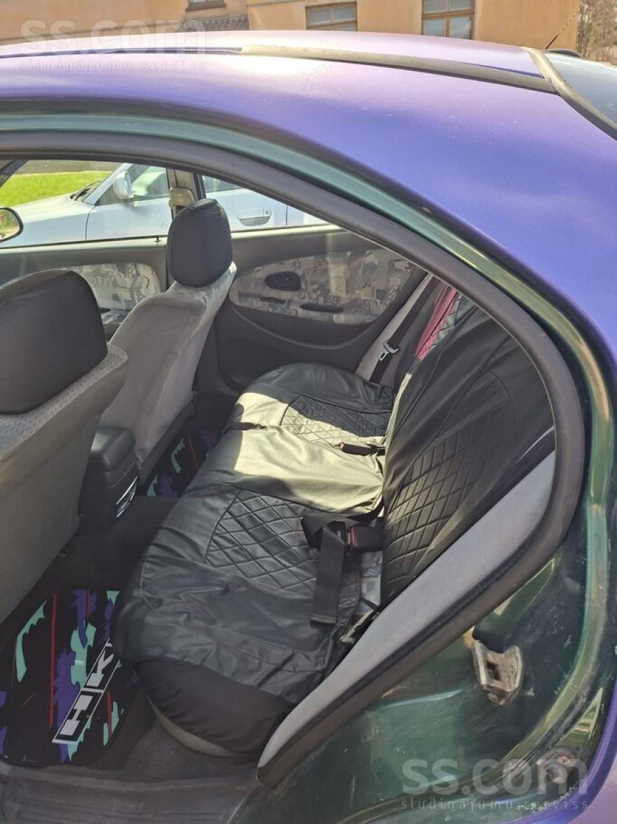 Violets Mitsubishi Carisma 1997 Valmiera, ar dzinēja tilpumu 1.90 L un nobraukumu 372 tūkst. km par 900 €, foto 6 vietnē AUTOMOTO.COM.LV