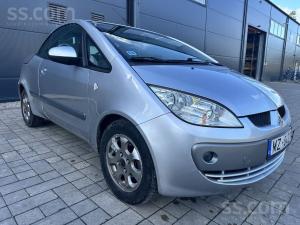 Melns Mitsubishi Colt 2006 Jūrmala, ar dzinēja tilpumu 1.50 L un nobraukumu 243 tūkst. km par 1090 €, foto  vietnē AUTOMOTO.COM.LV