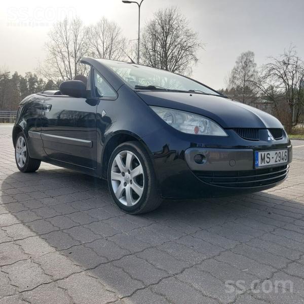 Black Mitsubishi Colt 2007 in Riga, with an engine capacity of 1.50 L and mileage of 159 thousand km for 1900 €, photo 2 on AUTOMOTO.COM.LV