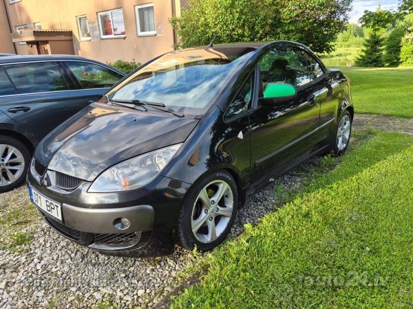 Black Mitsubishi Colt 2007 in Tallinn, with an engine capacity of 1.50 L and mileage of 171 thousand km for 4499 €, photo 9 on AUTOMOTO.COM.LV