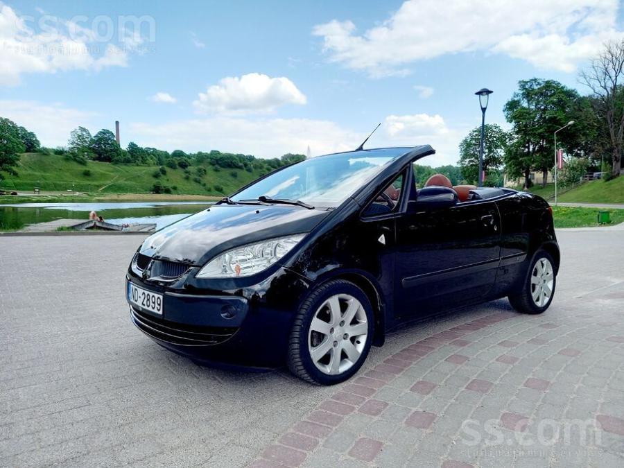 Black Mitsubishi Colt 2008 in Riga, with an engine capacity of 1.50 L and mileage of 130 thousand km for 1450 €, photo 2 on AUTOMOTO.COM.LV
