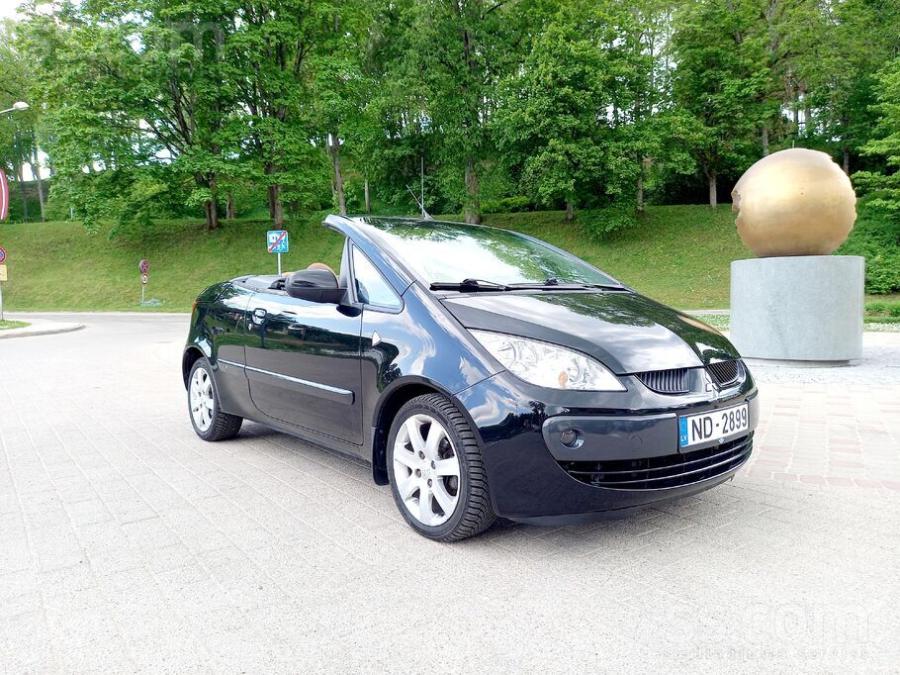 Black Mitsubishi Colt 2008 in Riga, with an engine capacity of 1.50 L and mileage of 130 thousand km for 1450 €, photo 4 on AUTOMOTO.COM.LV