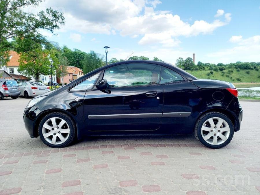 Black Mitsubishi Colt 2008 in Riga, with an engine capacity of 1.50 L and mileage of 130 thousand km for 1450 €, photo 8 on AUTOMOTO.COM.LV