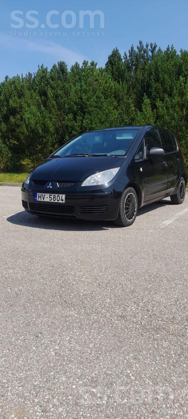 Black Mitsubishi Colt 2004 in Talsi, with an engine capacity of 1.50 L and mileage of 211 thousand km for 1350 €, photo 1 on AUTOMOTO.COM.LV