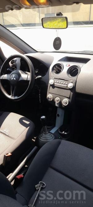 Melns Mitsubishi Colt 2004 Talsi, ar dzinēja tilpumu 1.50 L un nobraukumu 211 tūkst. km par 1350 €, foto 5 vietnē AUTOMOTO.COM.LV