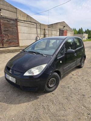 Black Mitsubishi Colt 2004 in Kupiskis, with an engine capacity of 1.30 L and mileage of 325 thousand km for 650 €, photo  on AUTOMOTO.COM.LV