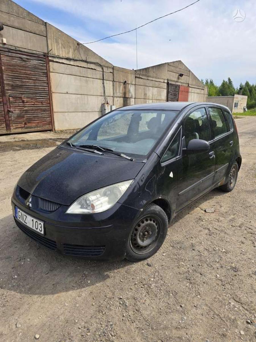 Black Mitsubishi Colt 2004 in Kupiskis, with an engine capacity of 1.30 L and mileage of 325 thousand km for 650 €, photo 1 on AUTOMOTO.COM.LV