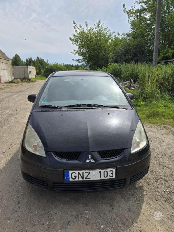 Black Mitsubishi Colt 2004 in Kupiskis, with an engine capacity of 1.30 L and mileage of 325 thousand km for 650 €, photo 2 on AUTOMOTO.COM.LV
