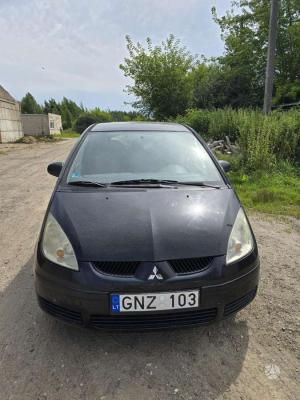 Black Mitsubishi Colt 2004 in Kupiskis, with an engine capacity of 1.30 L and mileage of 325 thousand km for 650 €, photo 3 on AUTOMOTO.COM.LV