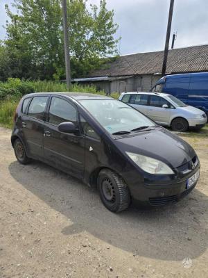 Black Mitsubishi Colt 2004 in Kupiskis, with an engine capacity of 1.30 L and mileage of 325 thousand km for 650 €, photo 4 on AUTOMOTO.COM.LV