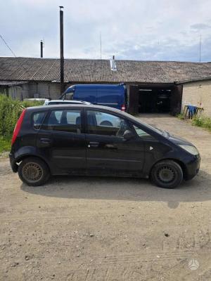 Black Mitsubishi Colt 2004 in Kupiskis, with an engine capacity of 1.30 L and mileage of 325 thousand km for 650 €, photo 5 on AUTOMOTO.COM.LV