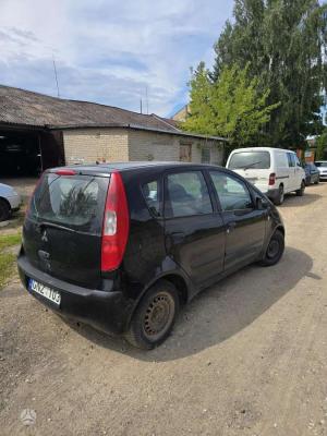 Black Mitsubishi Colt 2004 in Kupiskis, with an engine capacity of 1.30 L and mileage of 325 thousand km for 650 €, photo 6 on AUTOMOTO.COM.LV