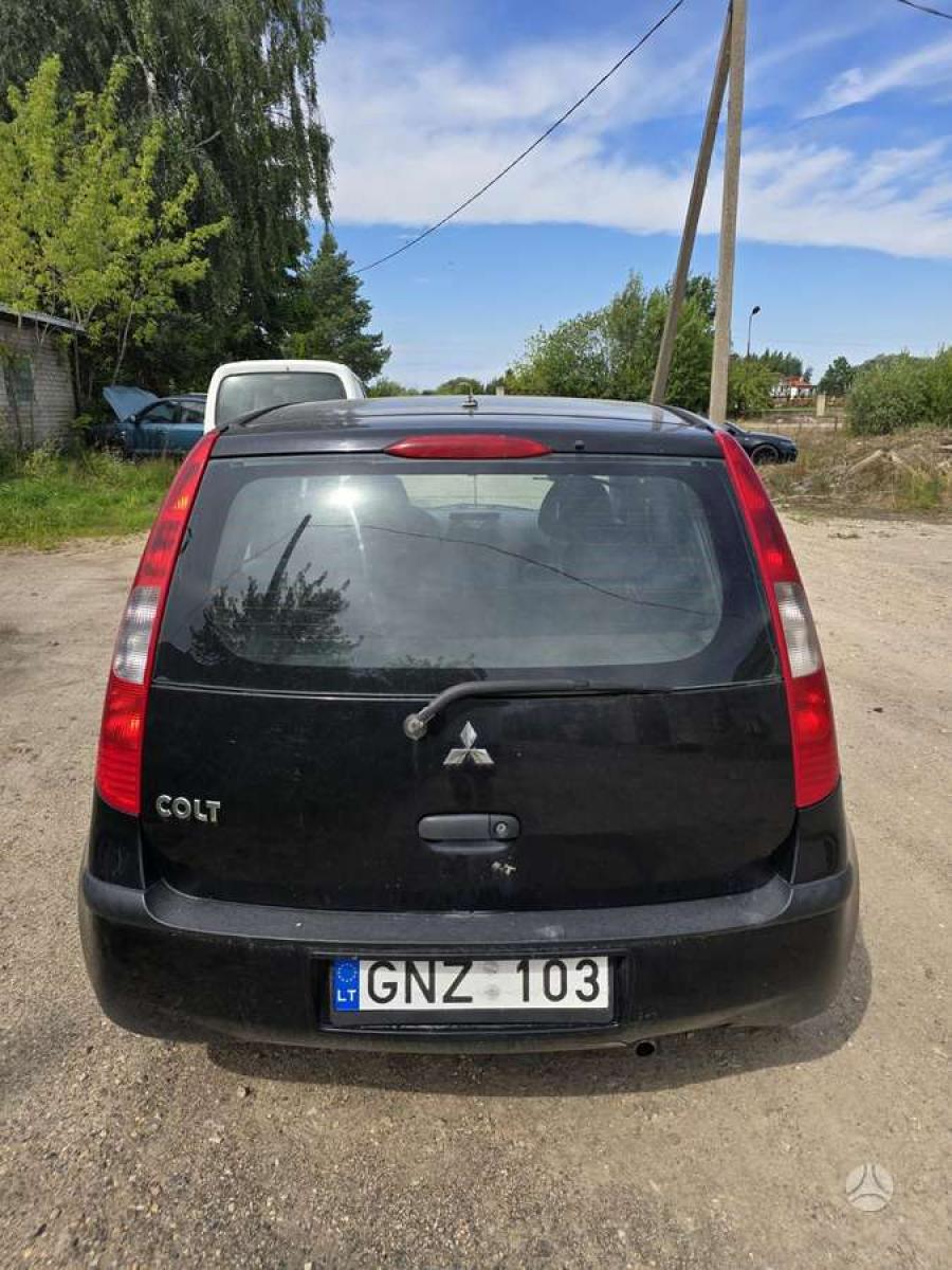 Black Mitsubishi Colt 2004 in Kupiskis, with an engine capacity of 1.30 L and mileage of 325 thousand km for 650 €, photo 7 on AUTOMOTO.COM.LV
