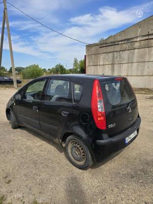 Black Mitsubishi Colt 2004 in Kupiskis, with an engine capacity of 1.30 L and mileage of 325 thousand km for 650 €, photo 8 on AUTOMOTO.COM.LV