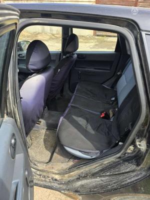 Black Mitsubishi Colt 2004 in Kupiskis, with an engine capacity of 1.30 L and mileage of 325 thousand km for 650 €, photo 11 on AUTOMOTO.COM.LV