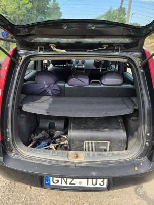 Black Mitsubishi Colt 2004 in Kupiskis, with an engine capacity of 1.30 L and mileage of 325 thousand km for 650 €, photo 12 on AUTOMOTO.COM.LV