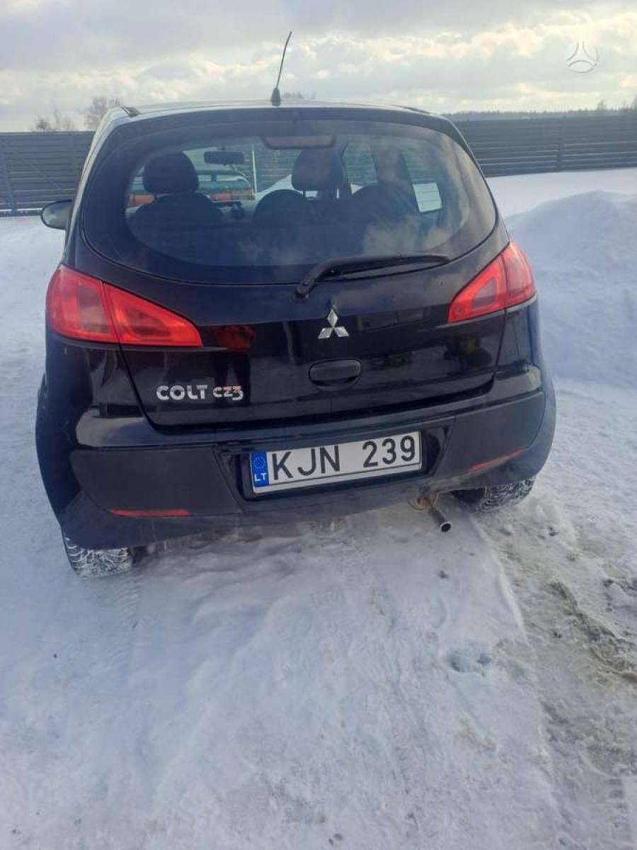 Black Mitsubishi Colt 2005 in Jonava, with an engine capacity of 1.12 L and mileage of 145 thousand km for 1350 €, photo 3 on AUTOMOTO.COM.LV