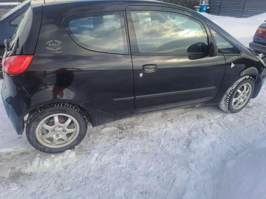 Black Mitsubishi Colt 2005 in Jonava, with an engine capacity of 1.12 L and mileage of 145 thousand km for 1350 €, photo 4 on AUTOMOTO.COM.LV