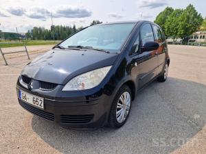 Black Mitsubishi Colt 2006 in Riga, with an engine capacity of 1.30 L and mileage of 174 thousand km for 950 €, photo  on AUTOMOTO.COM.LV