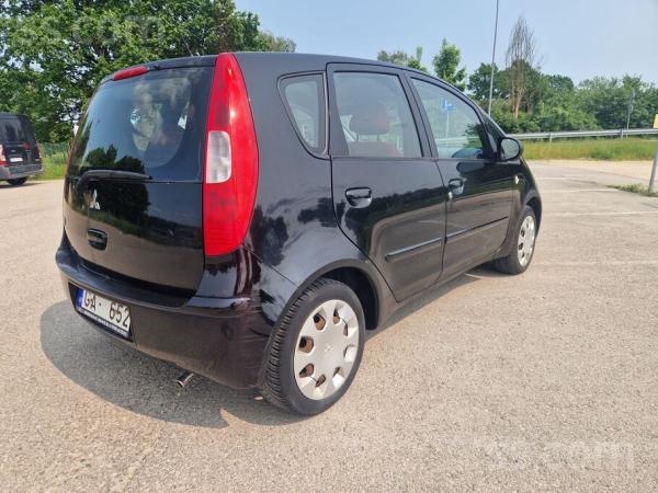Melns Mitsubishi Colt 2006 Rīga, ar dzinēja tilpumu 1.30 L un nobraukumu 174 tūkst. km par 890 €, foto 3 vietnē AUTOMOTO.COM.LV