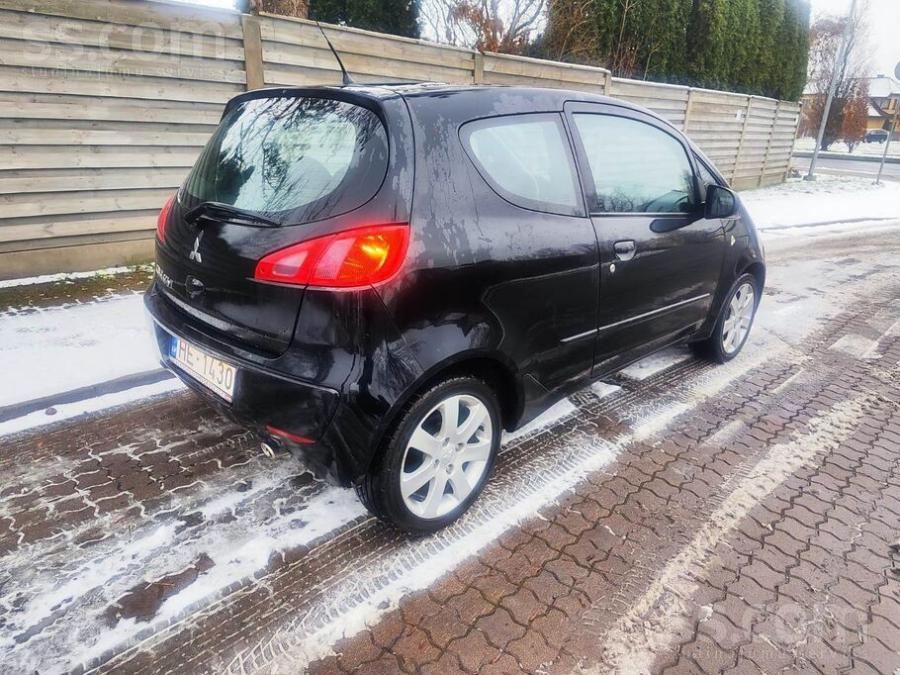 Black Mitsubishi Colt 2006 in Jelgava, with an engine capacity of 1.30 L and mileage of 155 thousand km for 1099 €, photo 2 on AUTOMOTO.COM.LV