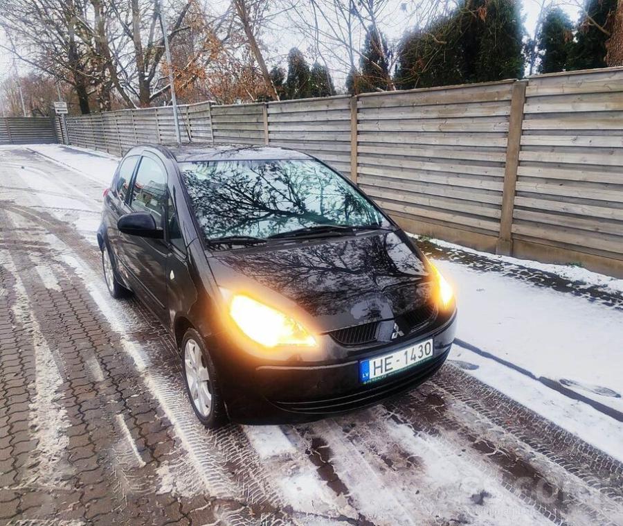 Black Mitsubishi Colt 2006 in Jelgava, with an engine capacity of 1.30 L and mileage of 155 thousand km for 1099 €, photo 4 on AUTOMOTO.COM.LV
